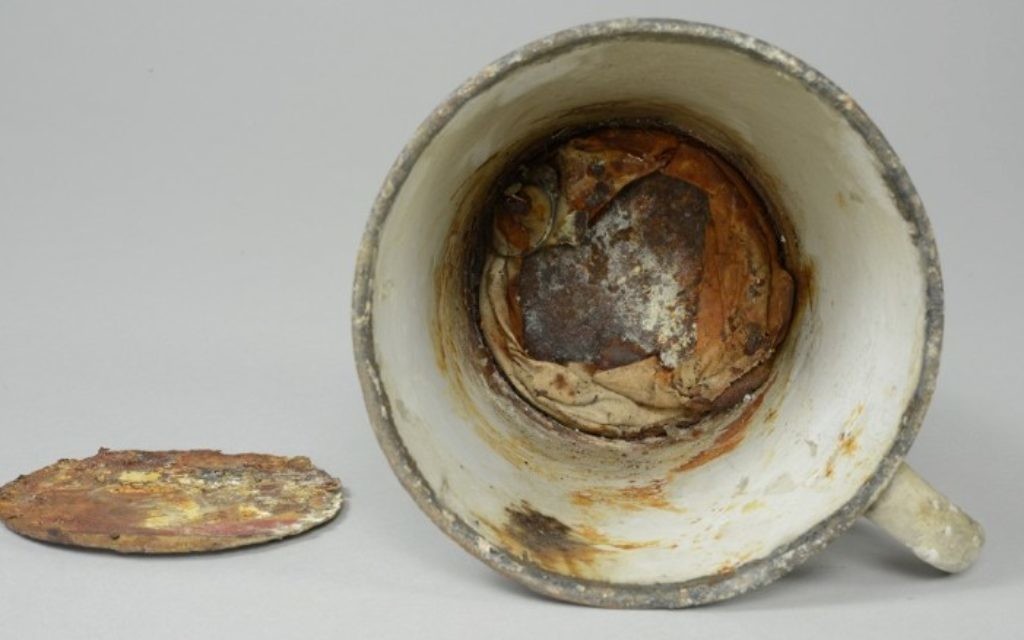 Auschwitz mug reveals ring and necklace hidden for 70 years | Jewish News