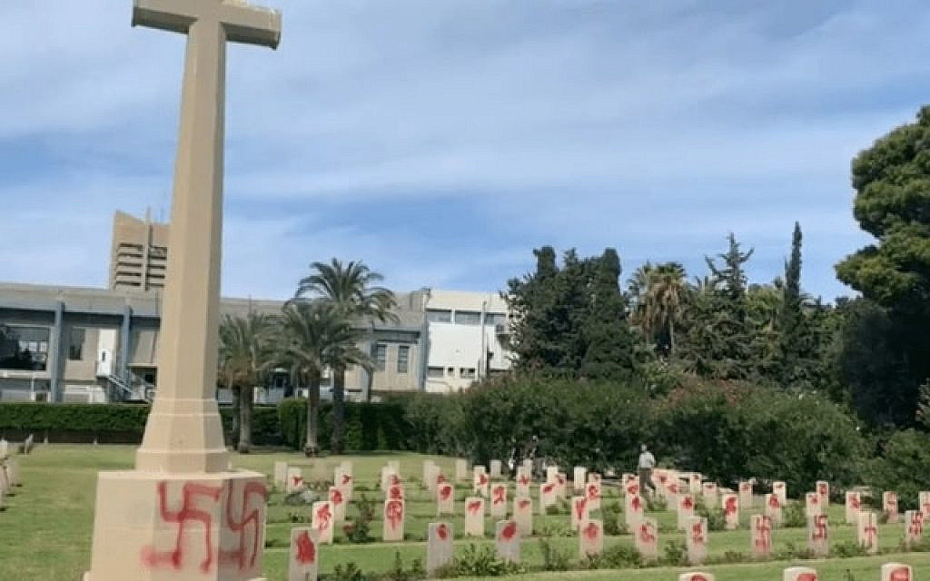 British war cemetery in Haifa vandalised with swastikas - Jewish News