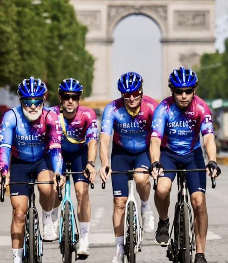 Former Hamas hostage rides through Paris with Israeli team at Tour de ...
