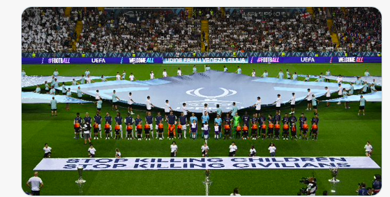 'STOP KILLING CHILDREN' banner displayed ON pitch ahead of Spurs ...