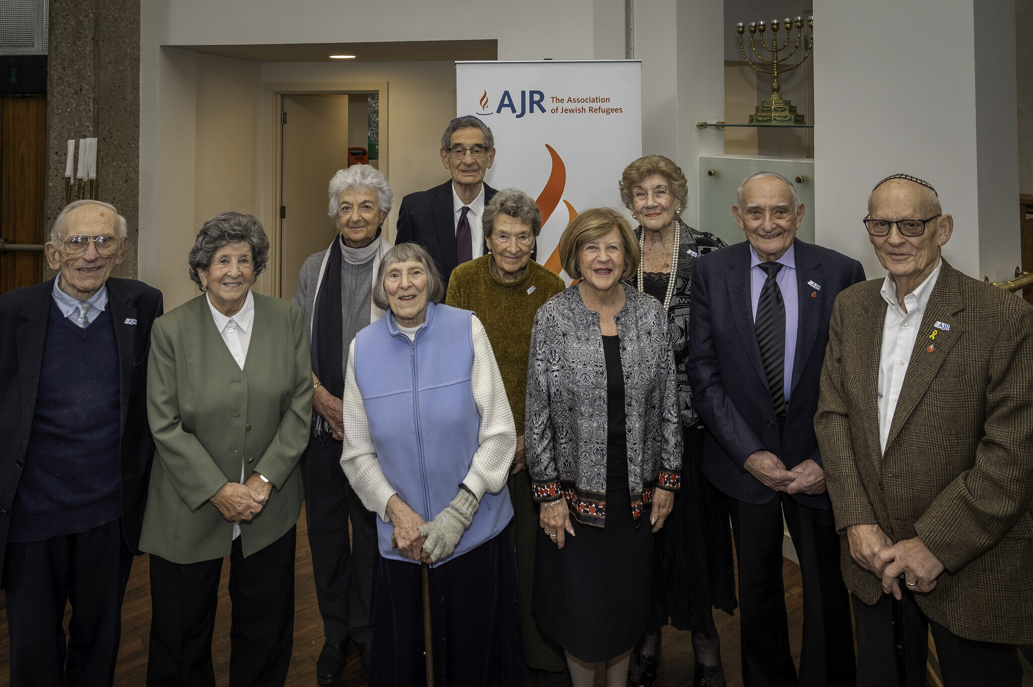 Survivors, diplomats and MPs gather to mark 87 years since ...